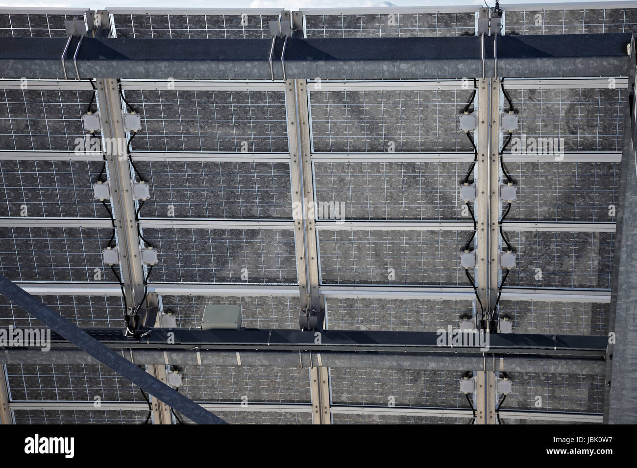 Big cluster of solar panels on a mountain peak Stock Photo - Alamy