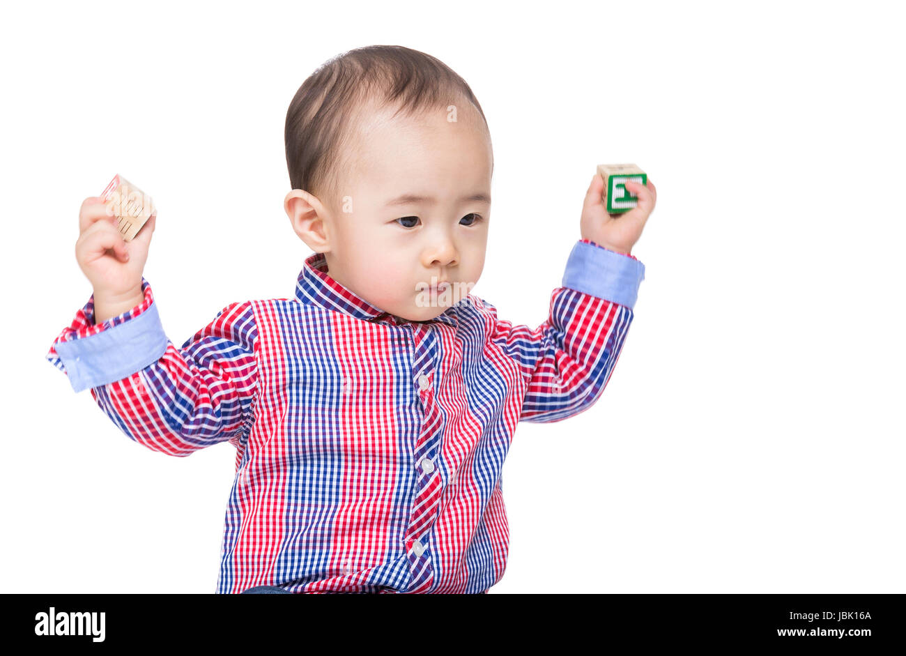 Asia baby boy throwing toy block Stock Photo - Alamy