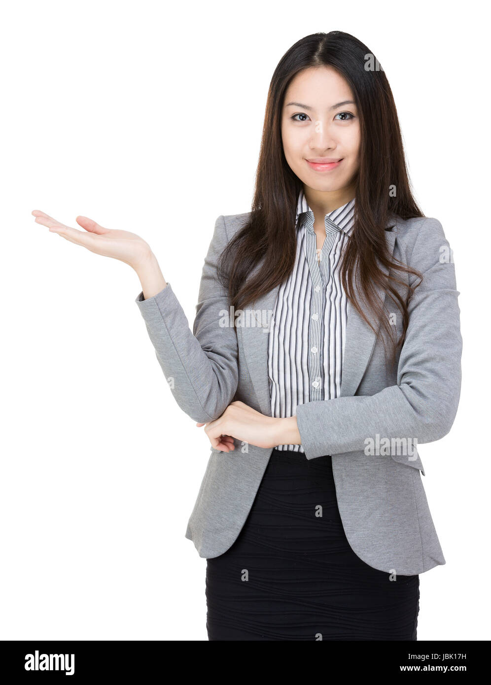 Business woman showing with hand Stock Photo - Alamy