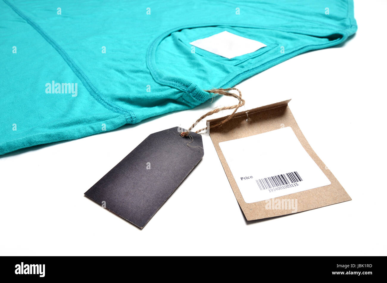 shirt with price tag on white background Stock Photo - Alamy