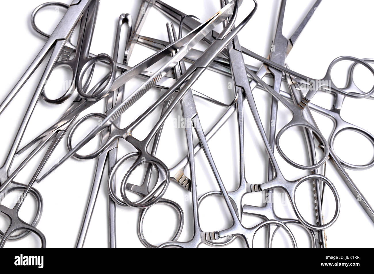 Surgical instruments isolated on white background Stock Photo - Alamy