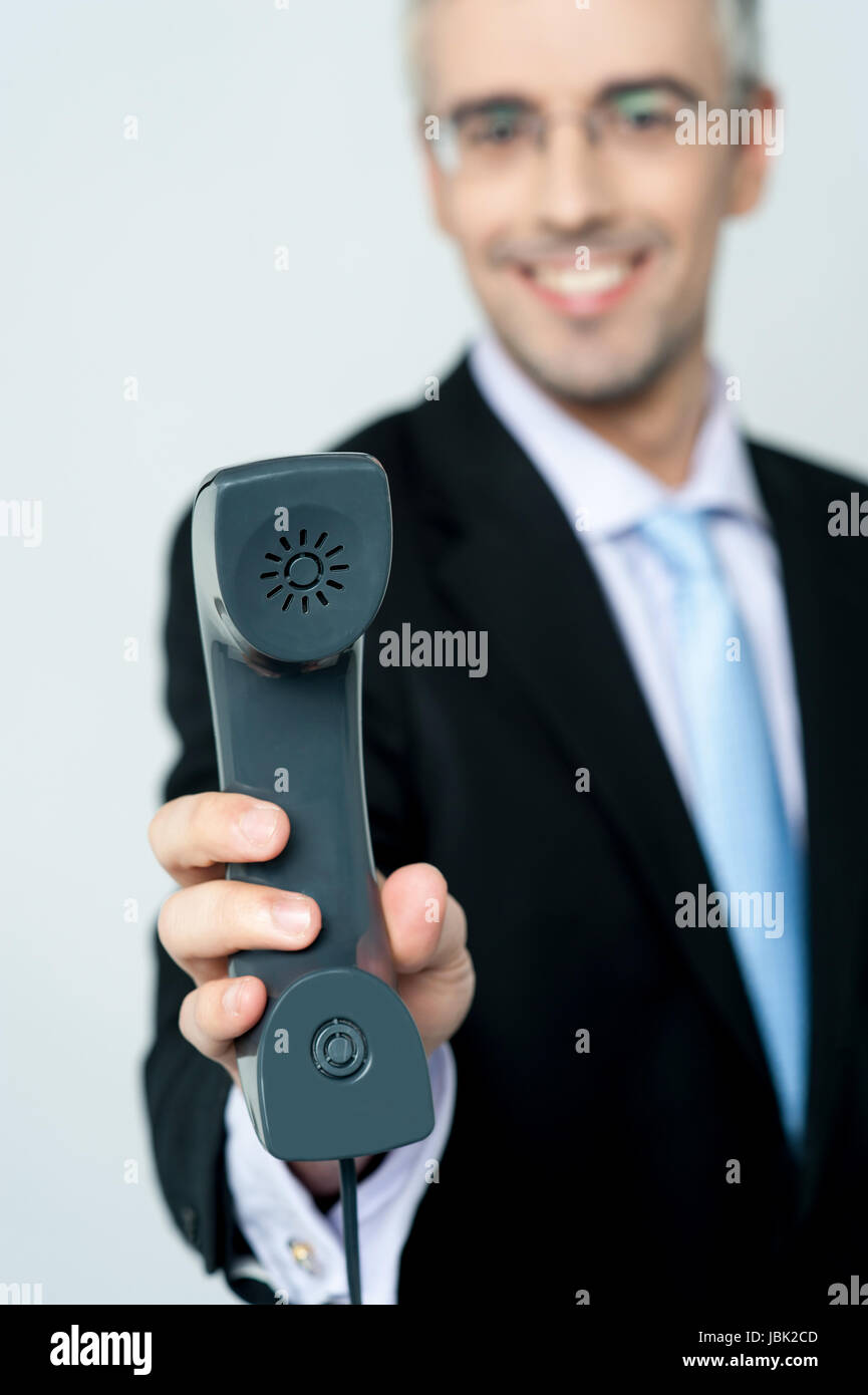 Employee posing phone receiver hi-res stock photography and images - Alamy