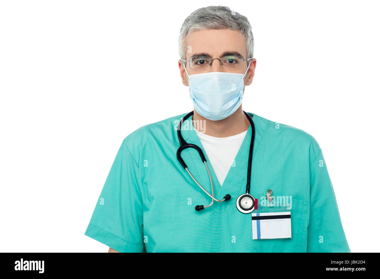 Male physician covering face with surgical mask Stock Photo - Alamy