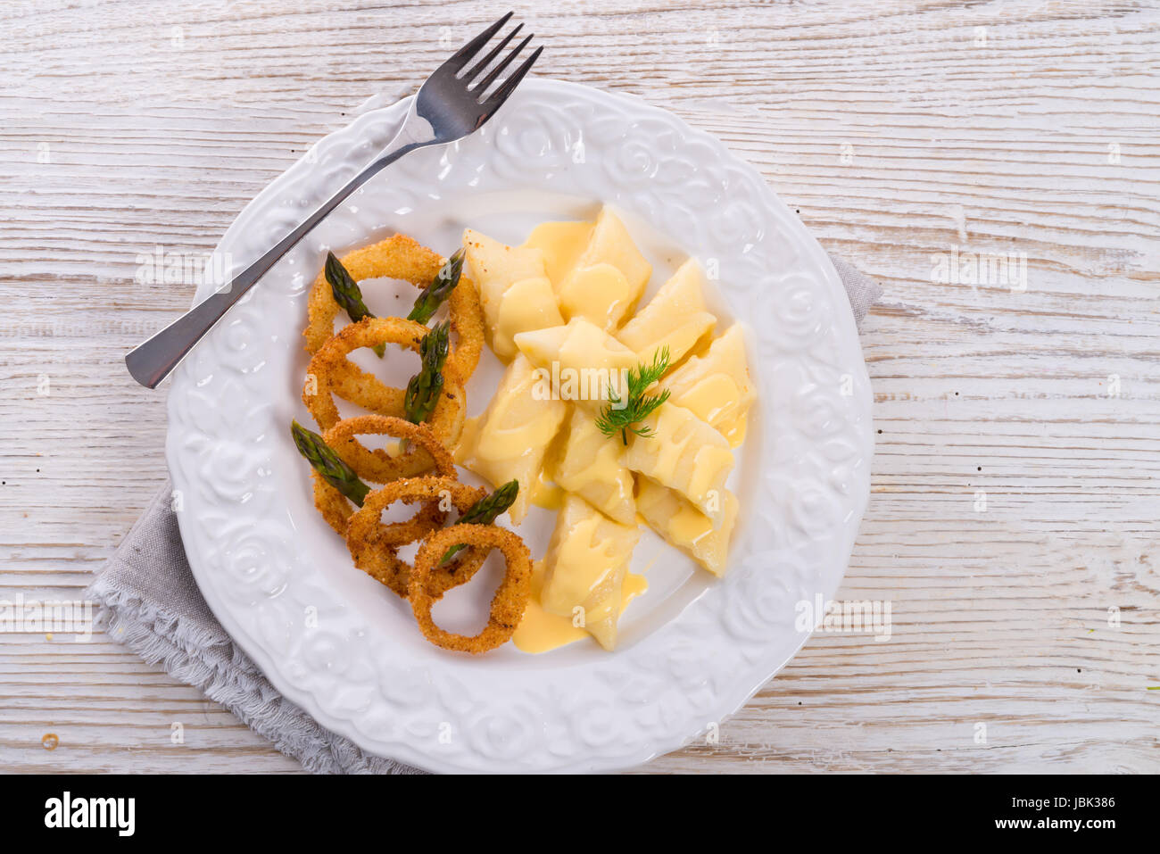 Onion ring white potato dumpling Stock Photo - Alamy
