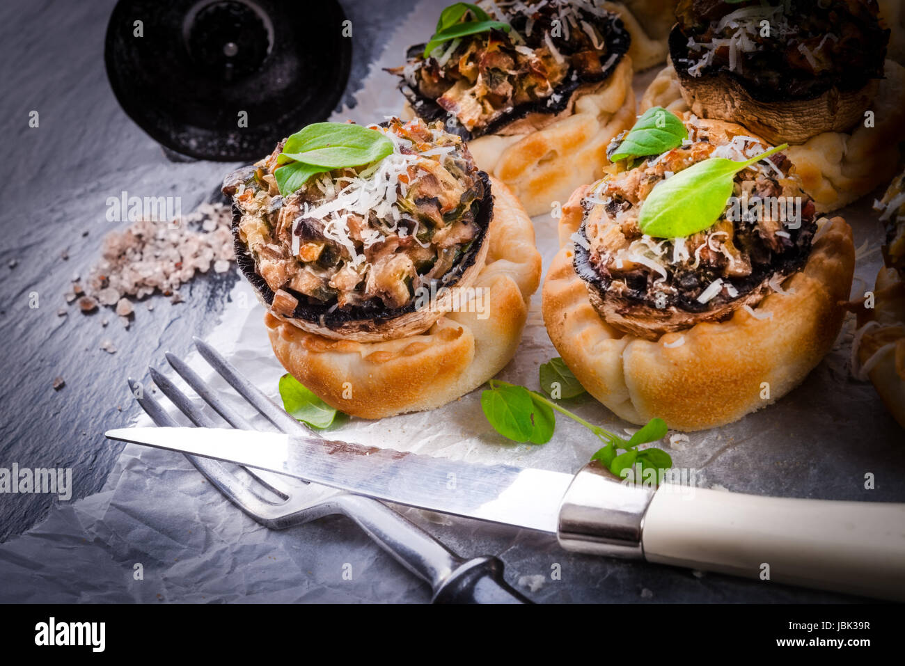 Champignons with puff pastry Stock Photo - Alamy