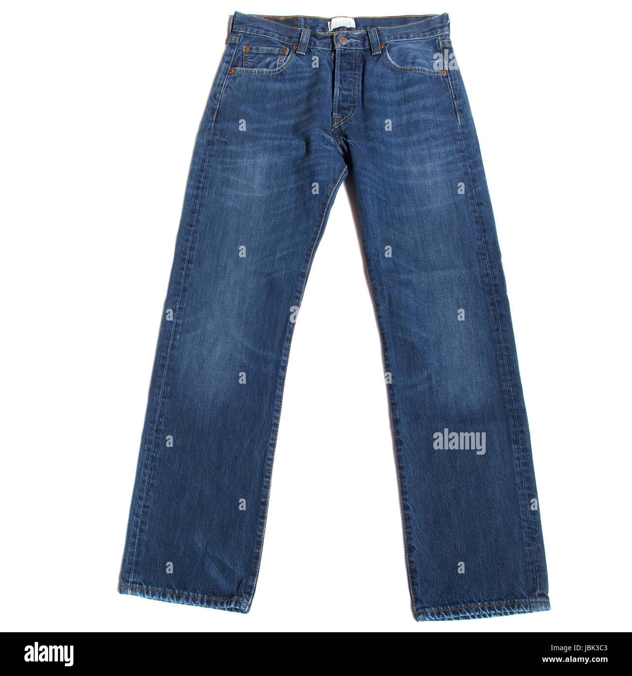 Classic blue jeans on white background Stock Photo - Alamy