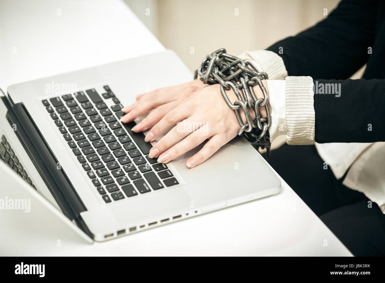 Hand tied up chain computer hi-res stock photography and images - Alamy
