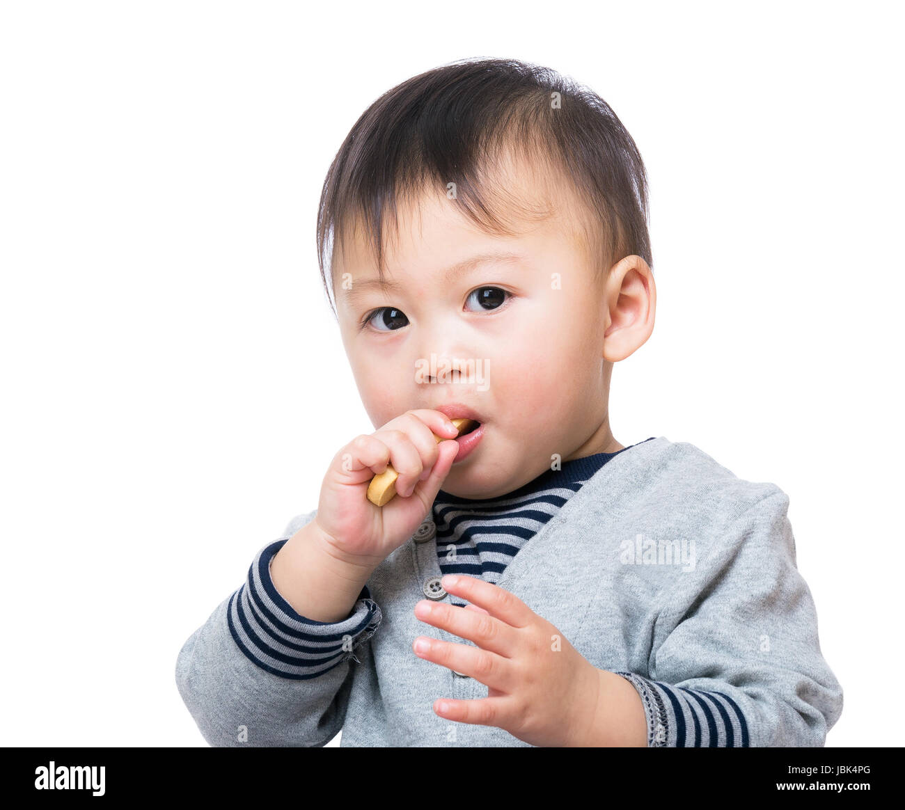 Child boy eating snack Stock Photo - Alamy