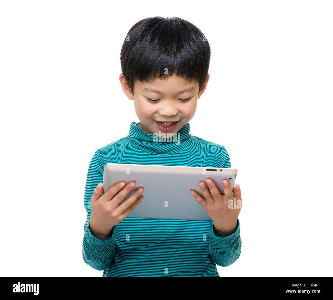 Little boy using tablet Stock Photo - Alamy