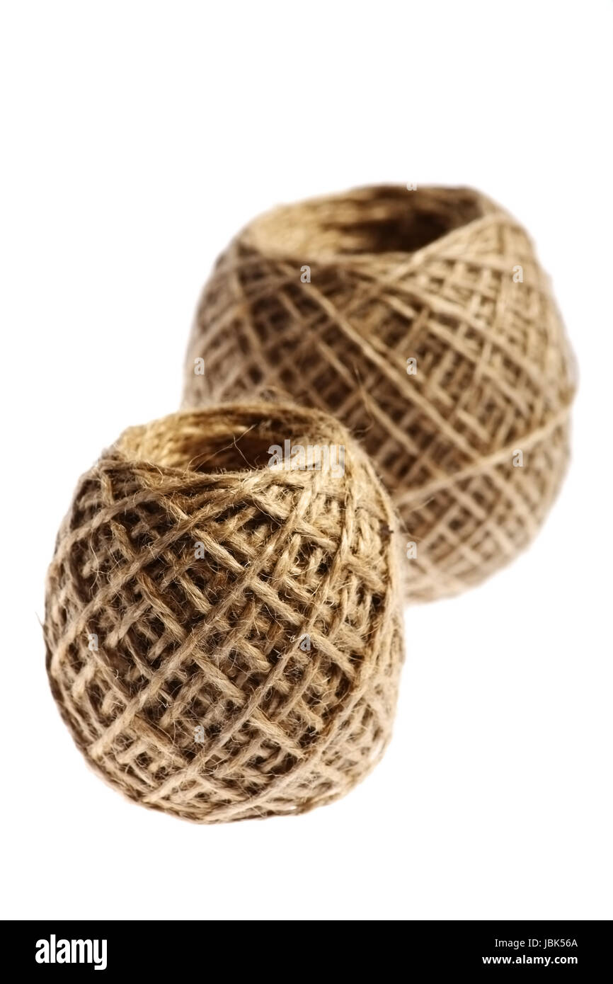 Color shot of two rope balls isolated on white Stock Photo - Alamy