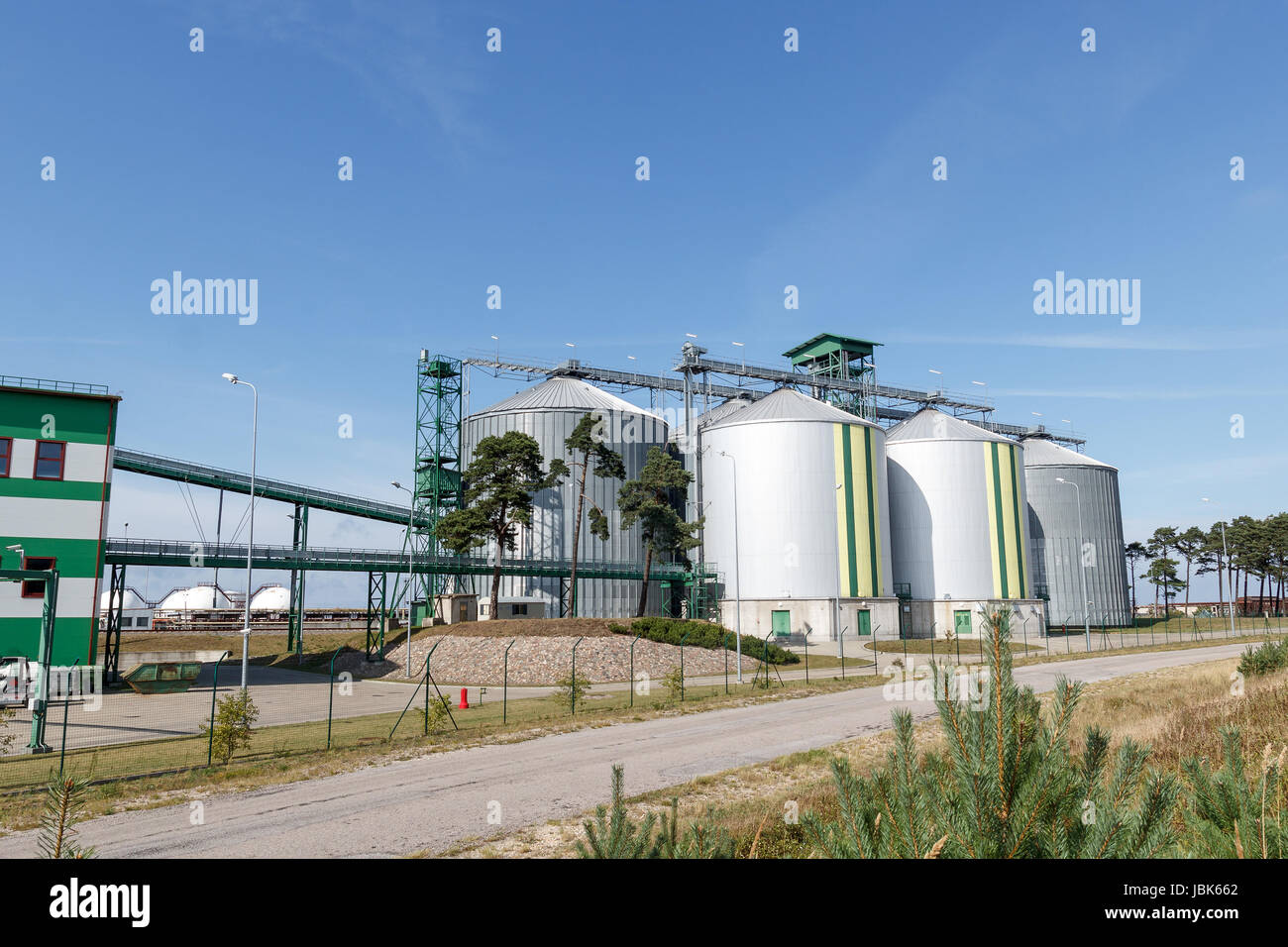 Multiple biological fuel storage tanks connected to the biofuel factory ...