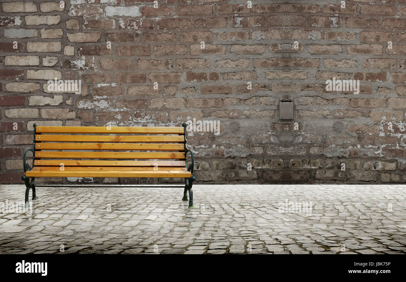 Paved road with bench chair and brick wall background Stock Photo - Alamy