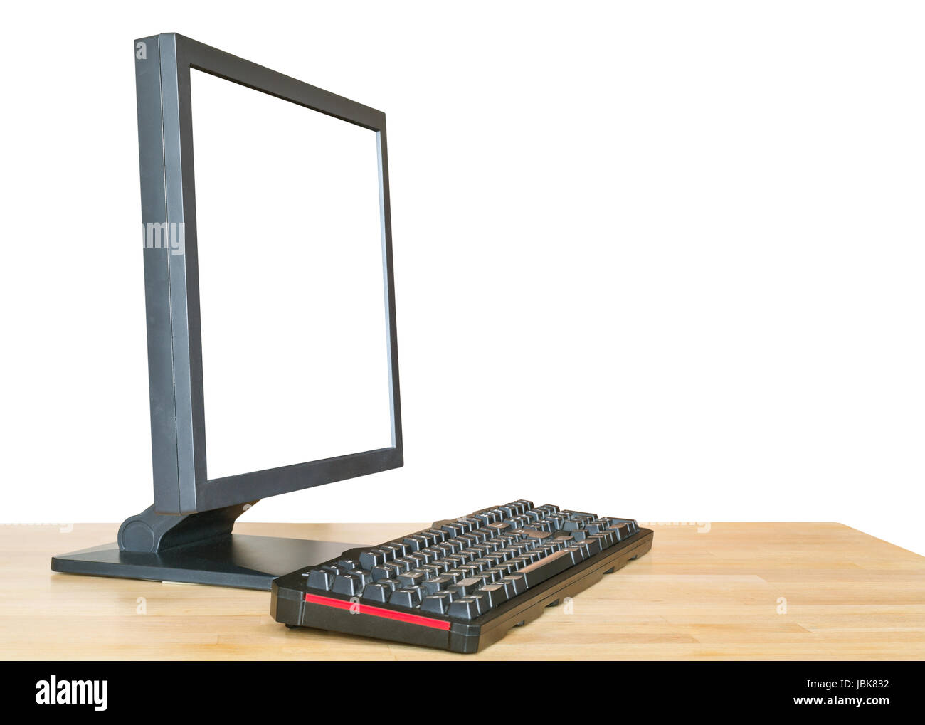 side view of black computer display with cut out screen and keyboard on ...