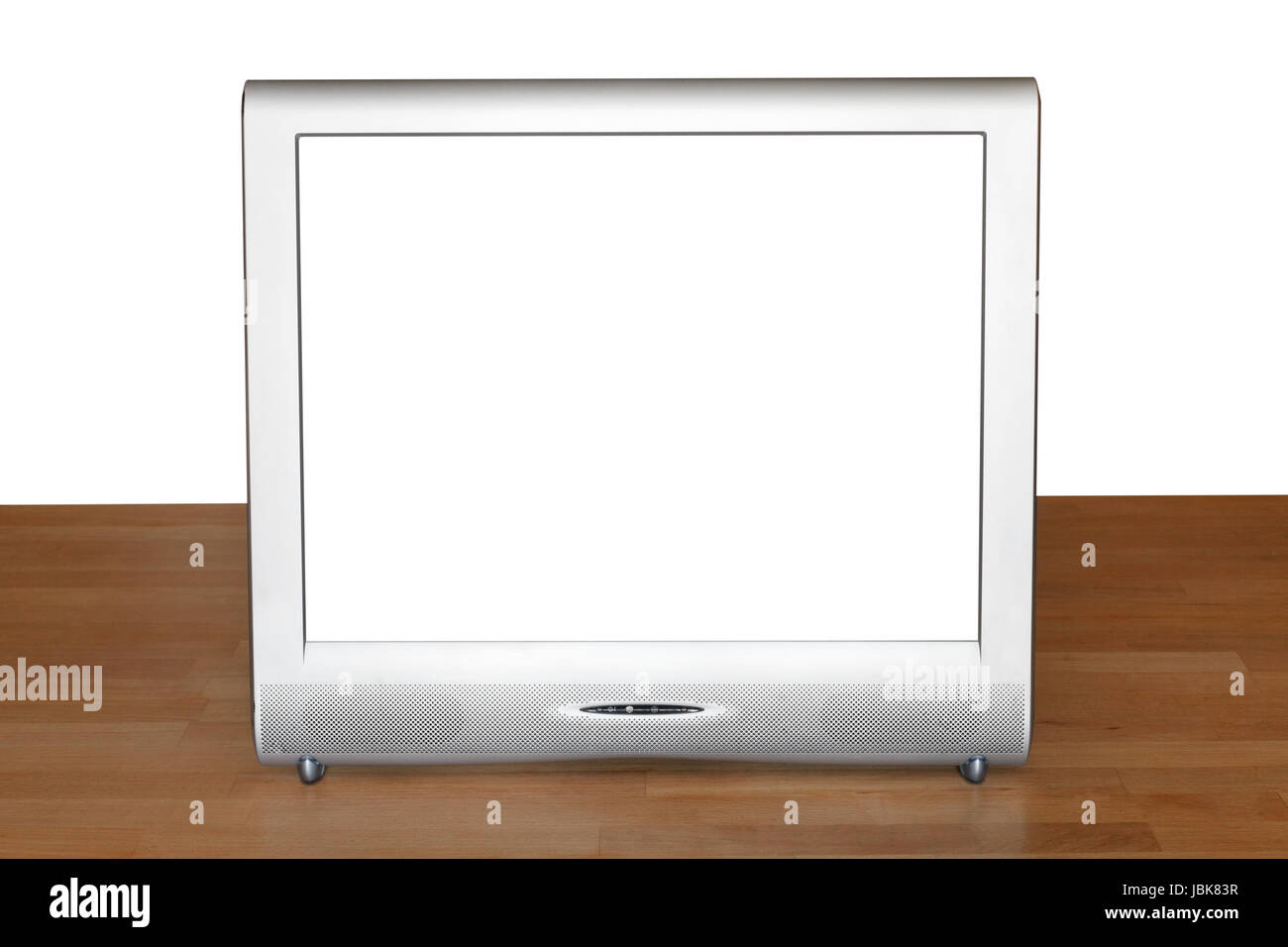 front view of silver TV set display with cutout screen on wood table ...