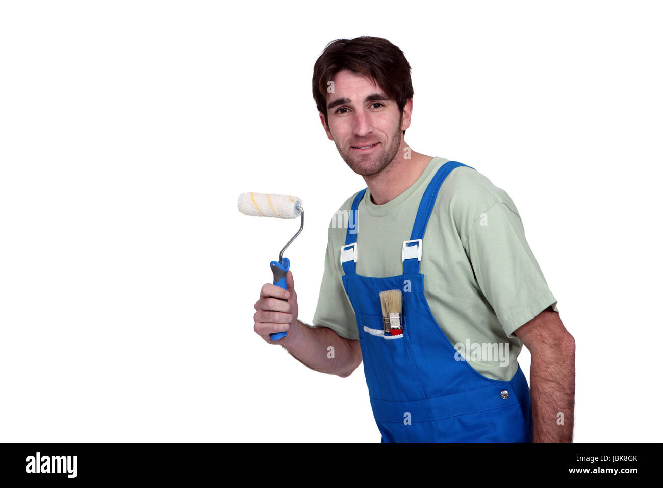 Painter with roller Stock Photo - Alamy