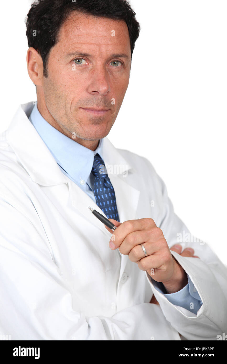 Male doctor with serious expression on face Stock Photo - Alamy