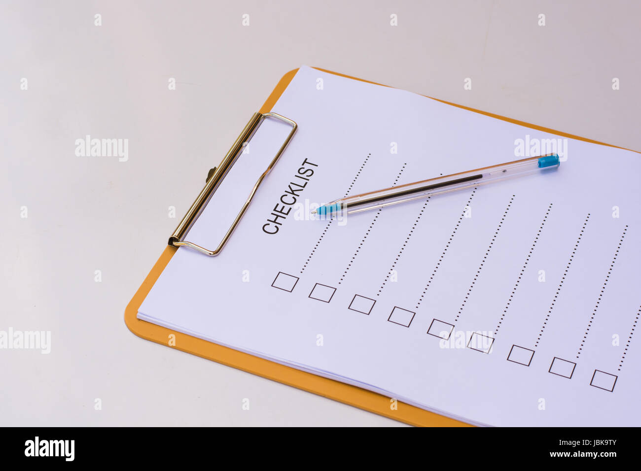 Checklist concept - checklist, paper and a pen with checklist word on ...
