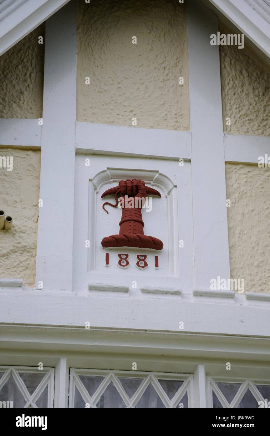 The Shuttleworth crest on No 36/37 The Village, Old Warden ...