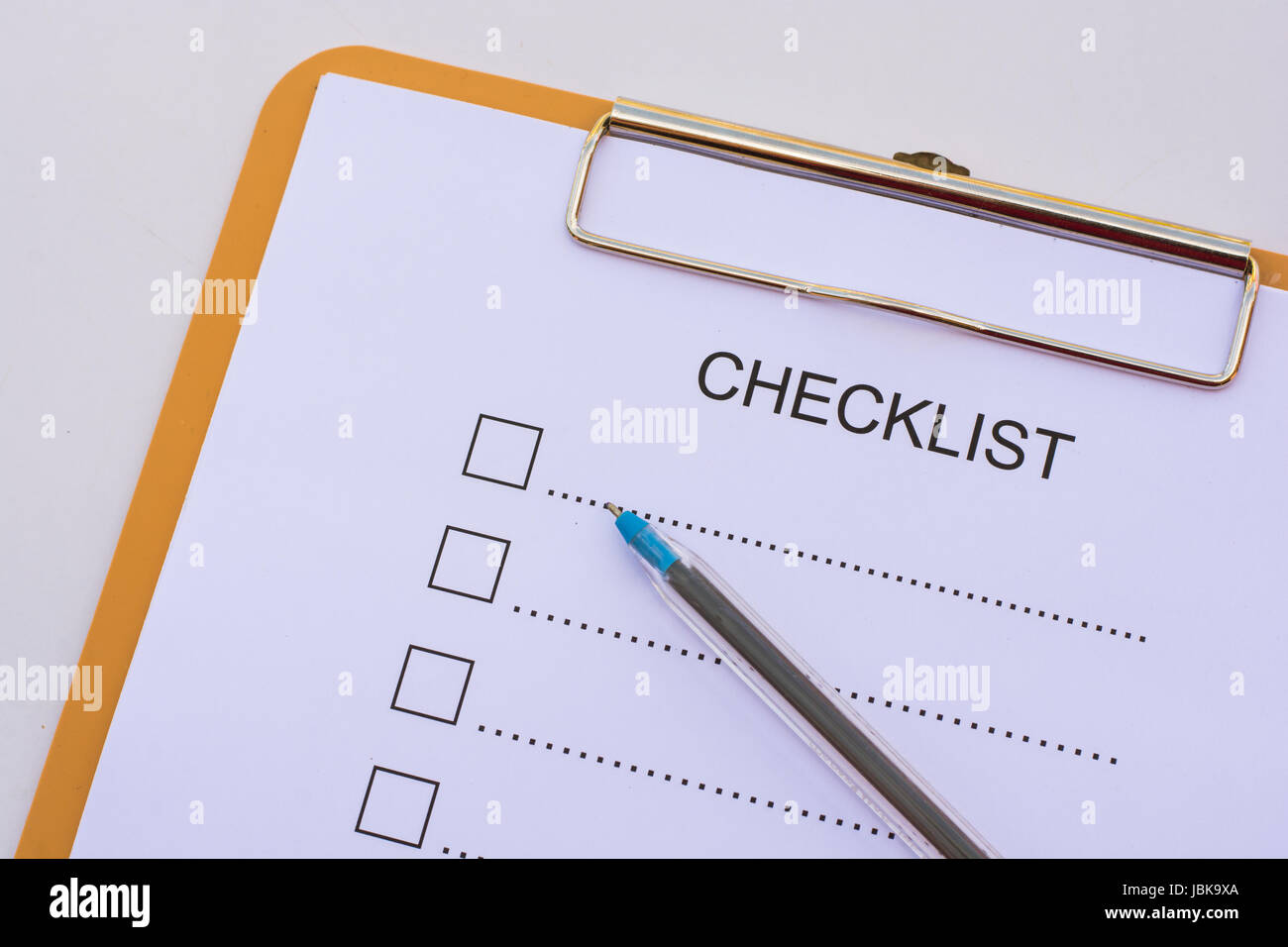 Checklist concept - checklist, paper and a pen with checklist word on ...