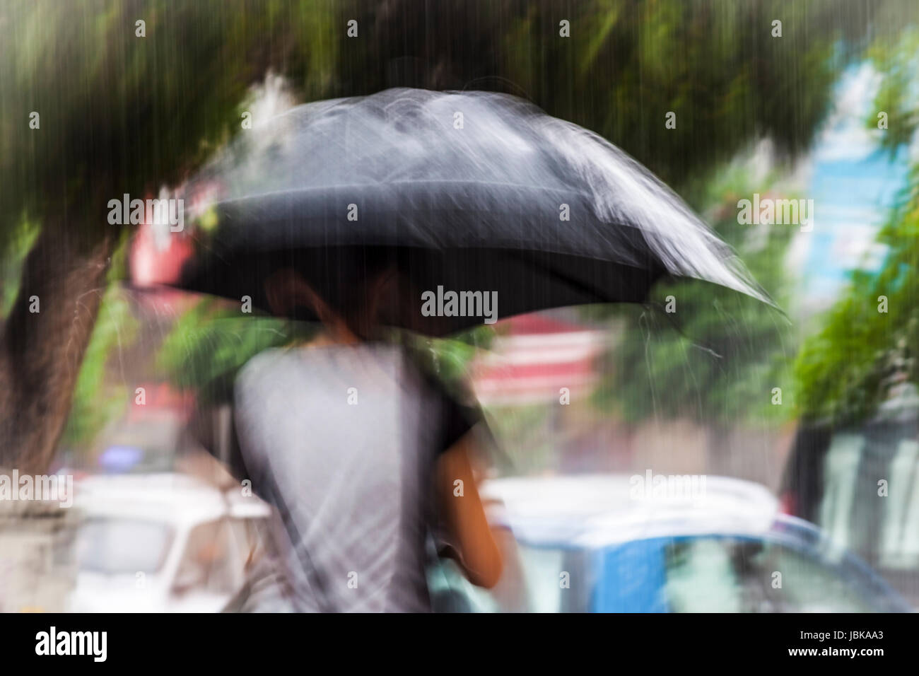 Rain in city cars move hi-res stock photography and images - Alamy