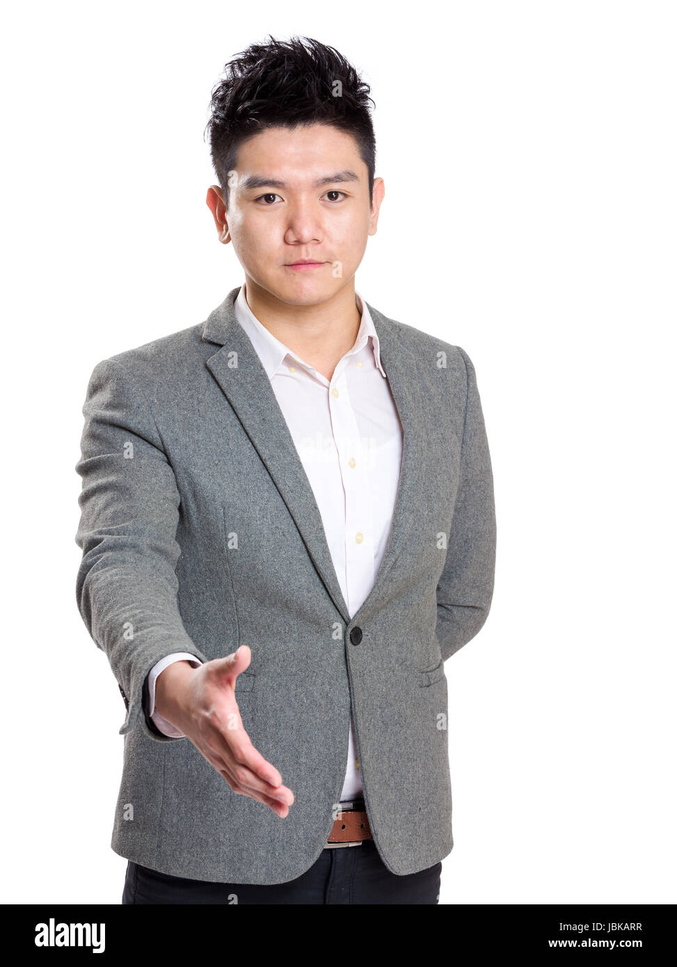 Successful businessman giving hand Stock Photo - Alamy