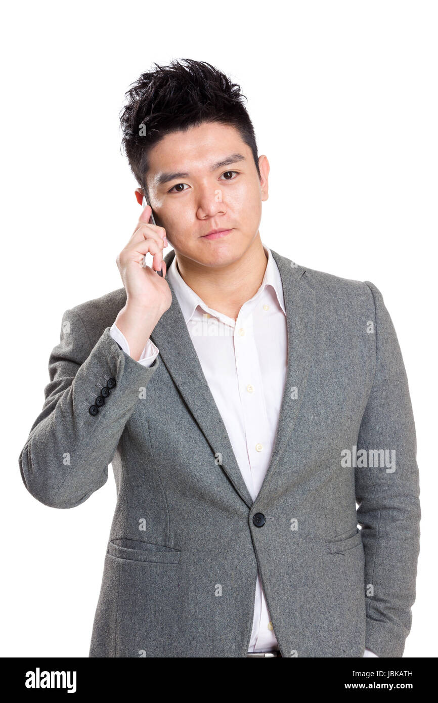 Business man talk to cell phone Stock Photo - Alamy