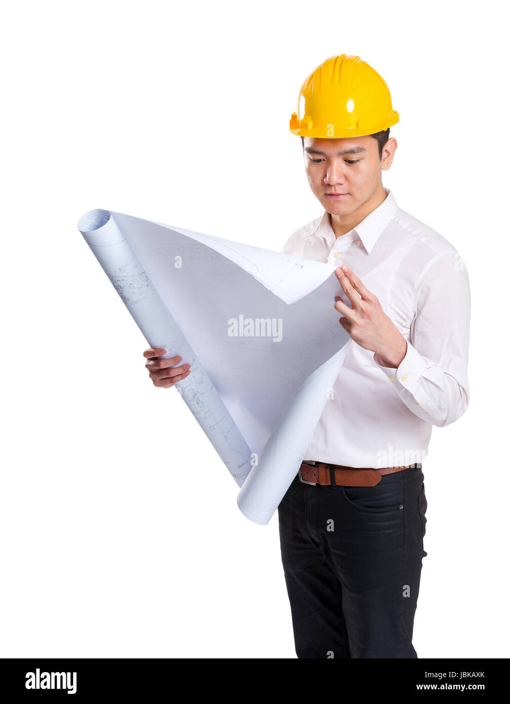 Asia construction engineer reading on blueprint Stock Photo - Alamy