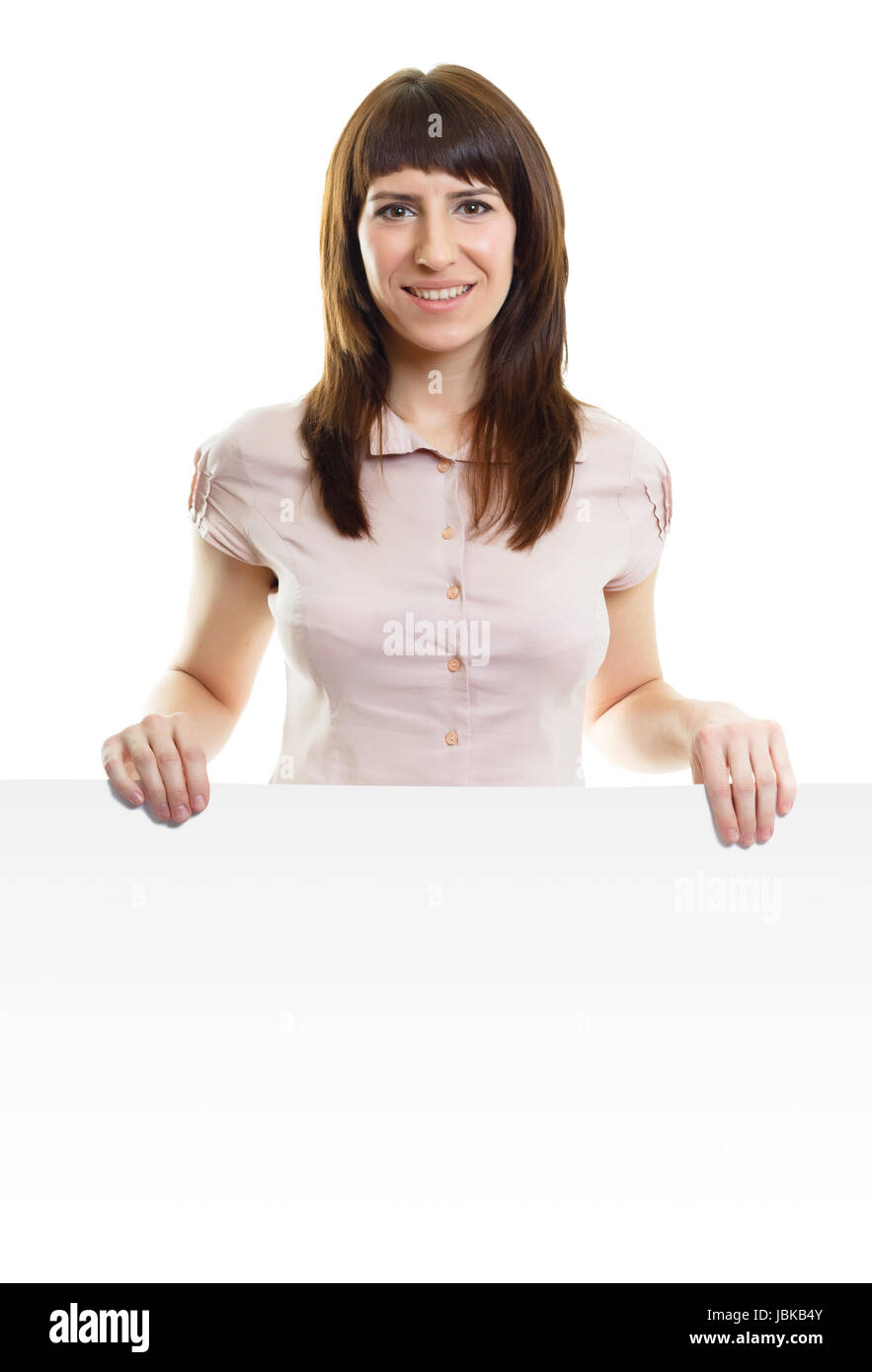 Attractive young woman with a poster on an isolated white background ...