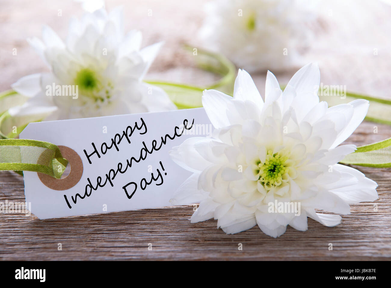 White Flowers with Happy Independence Day on a White Label Stock Photo ...