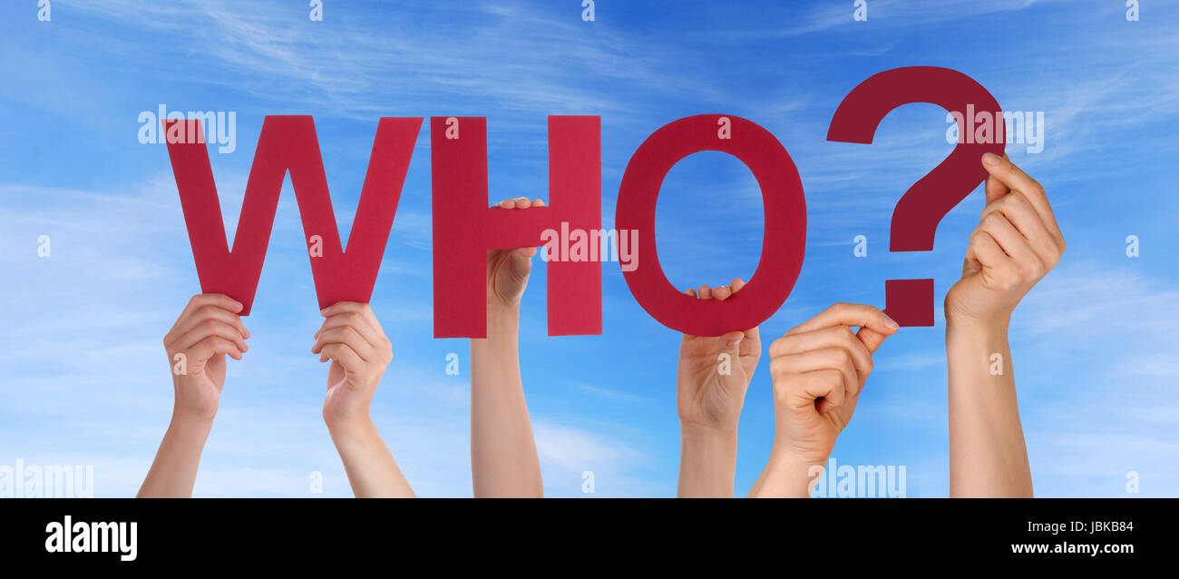 Many People Holding the Red Word Who in the Sky Stock Photo - Alamy