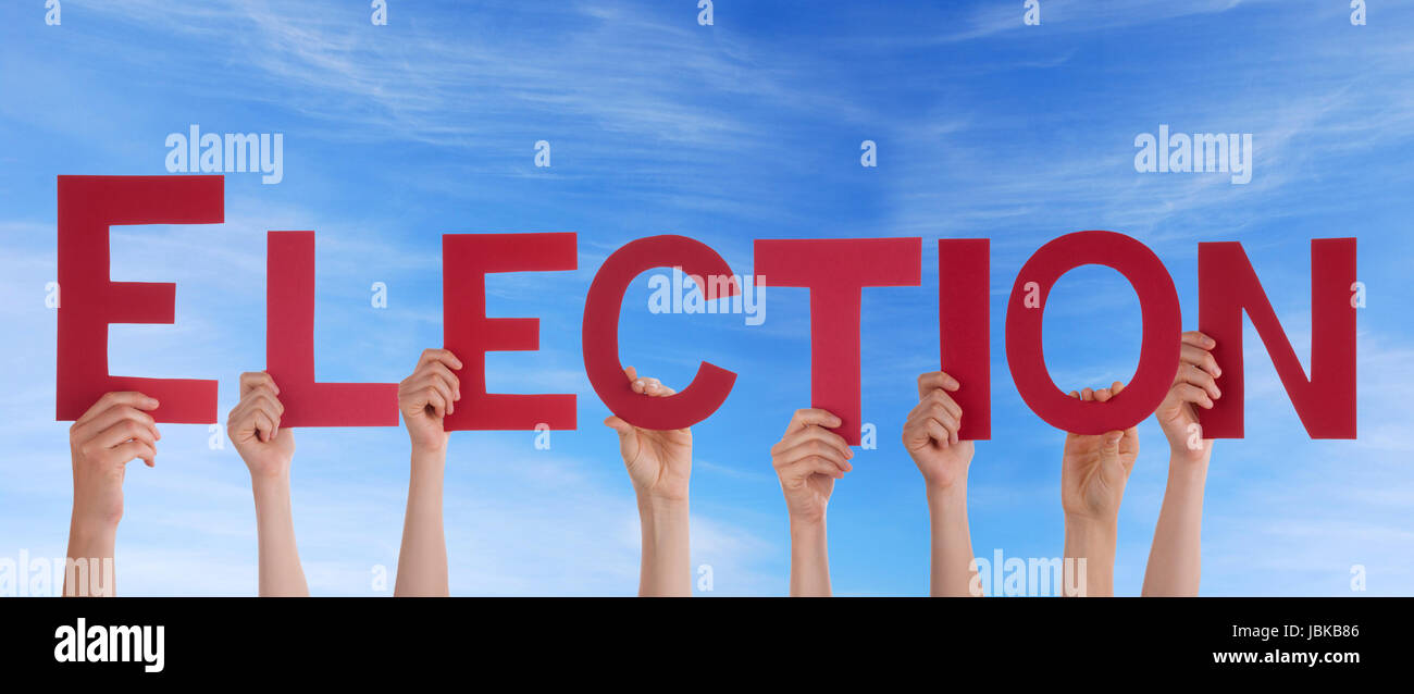 Many People Holding the Word Election in the Sky Stock Photo - Alamy