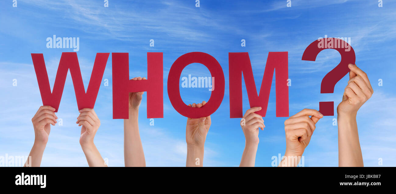 Many People Holding the Red Word Whom in the Sky Stock Photo - Alamy