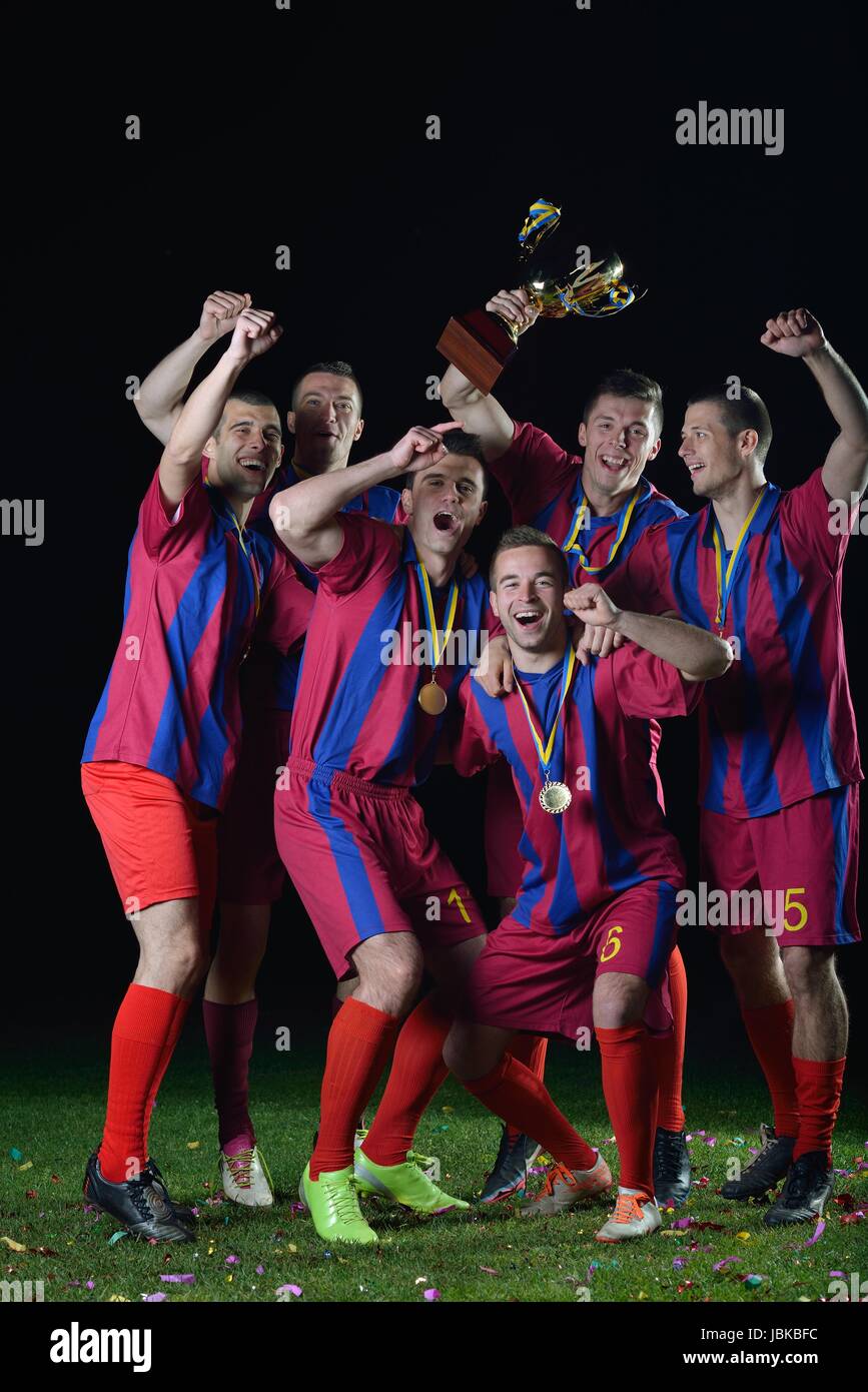 soccer players team group celebrating the victory and become champion ...