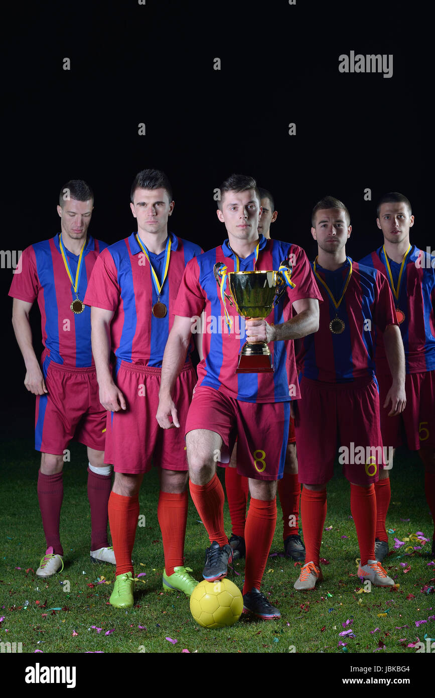 soccer players team group celebrating the victory and become champion ...