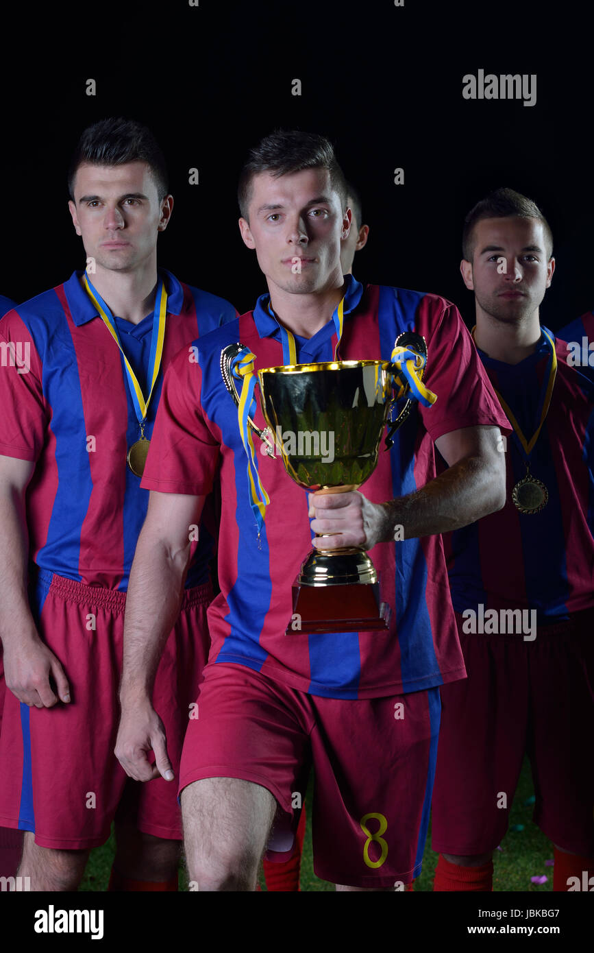 soccer players team group celebrating the victory and become champion ...