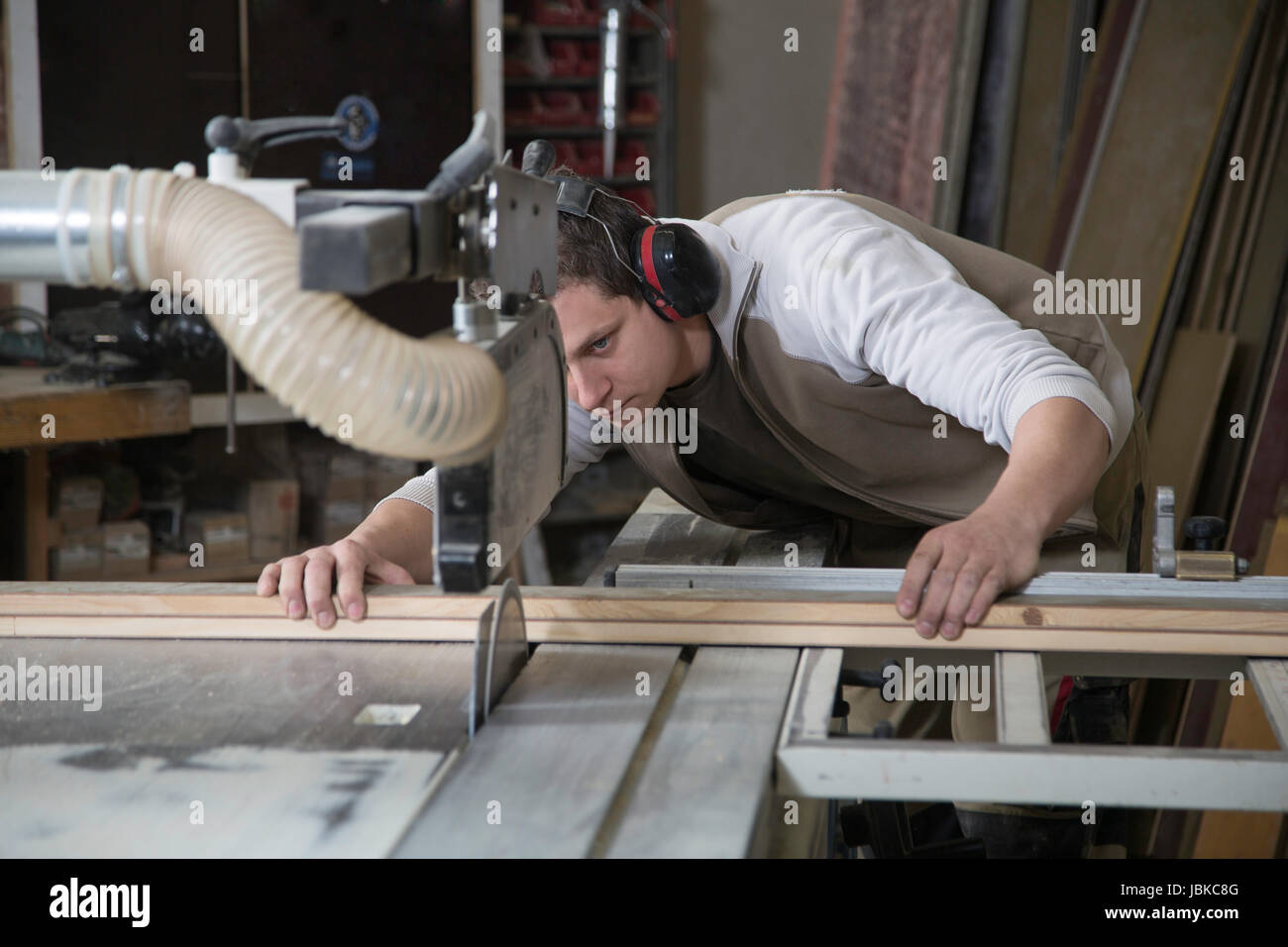 construction worker with circular saw Stock Photo - Alamy