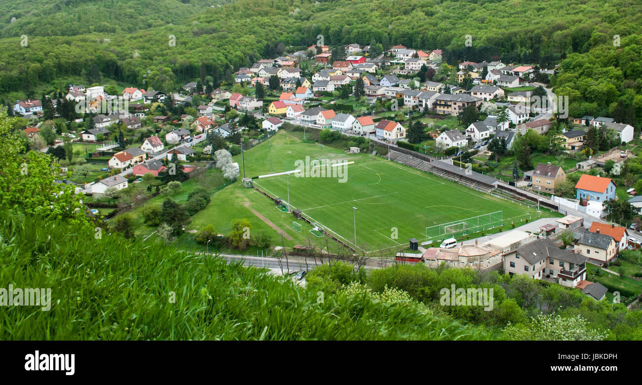 football field in a small town in the forest Stock Photo - Alamy