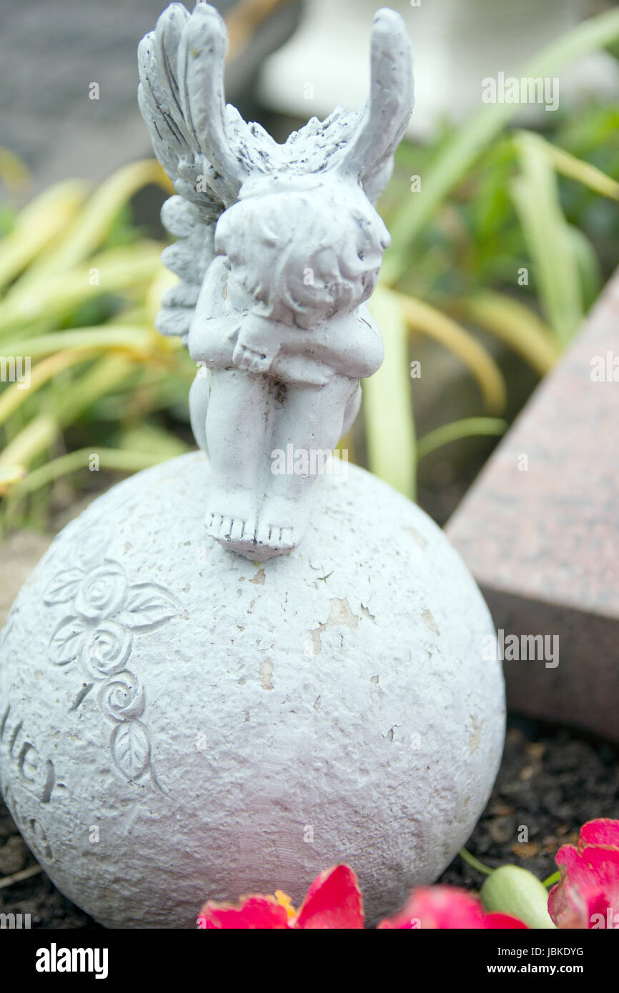 sadder angel in a cemetery Stock Photo - Alamy