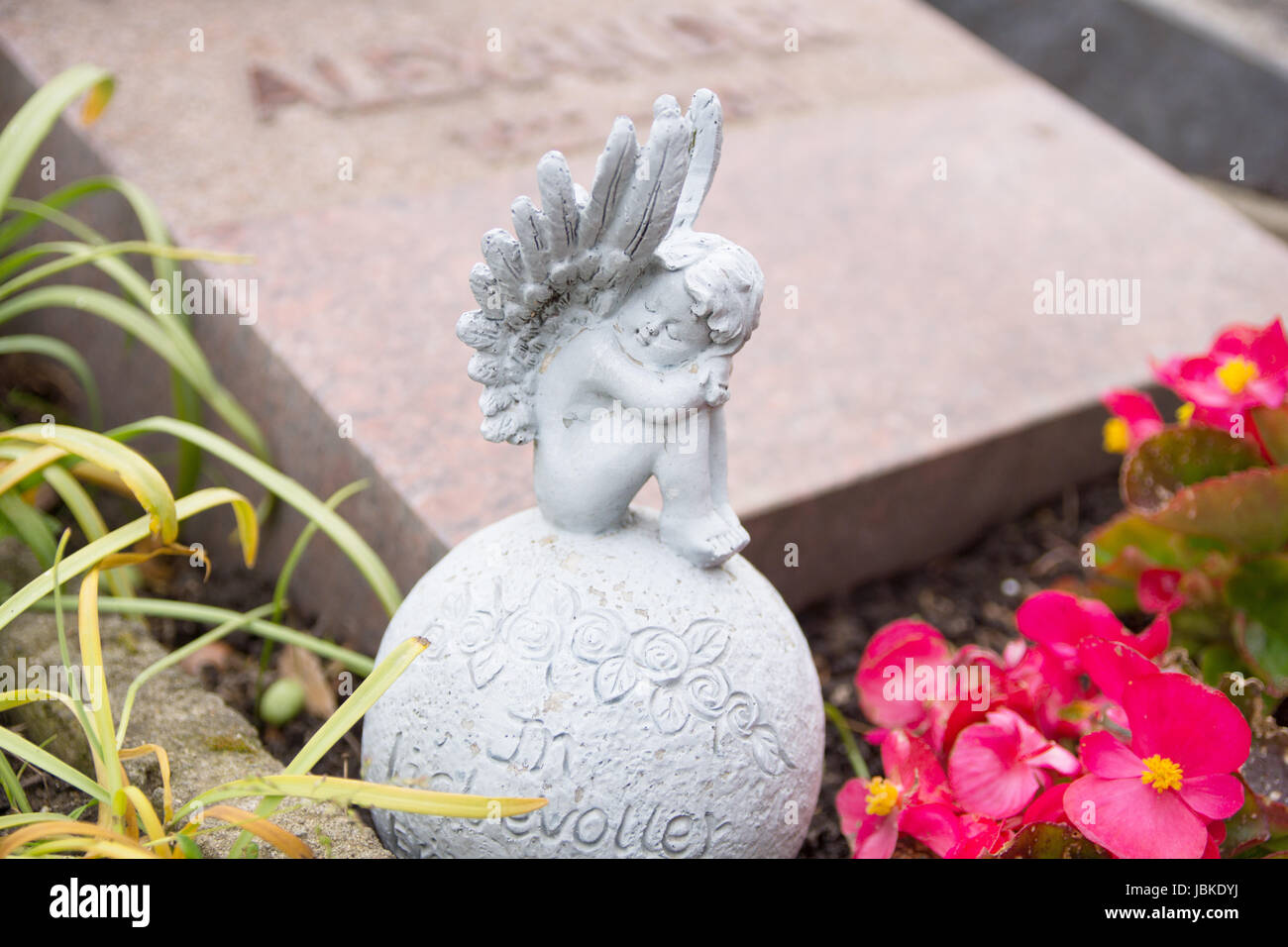 sadder angel in a cemetery Stock Photo - Alamy