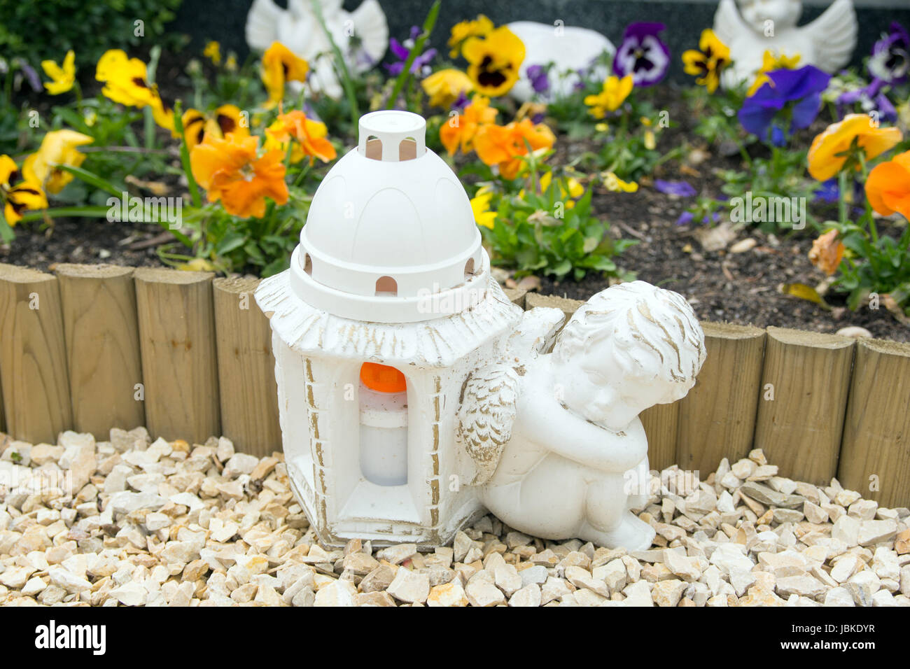 little Angel on a cemetery Stock Photo - Alamy