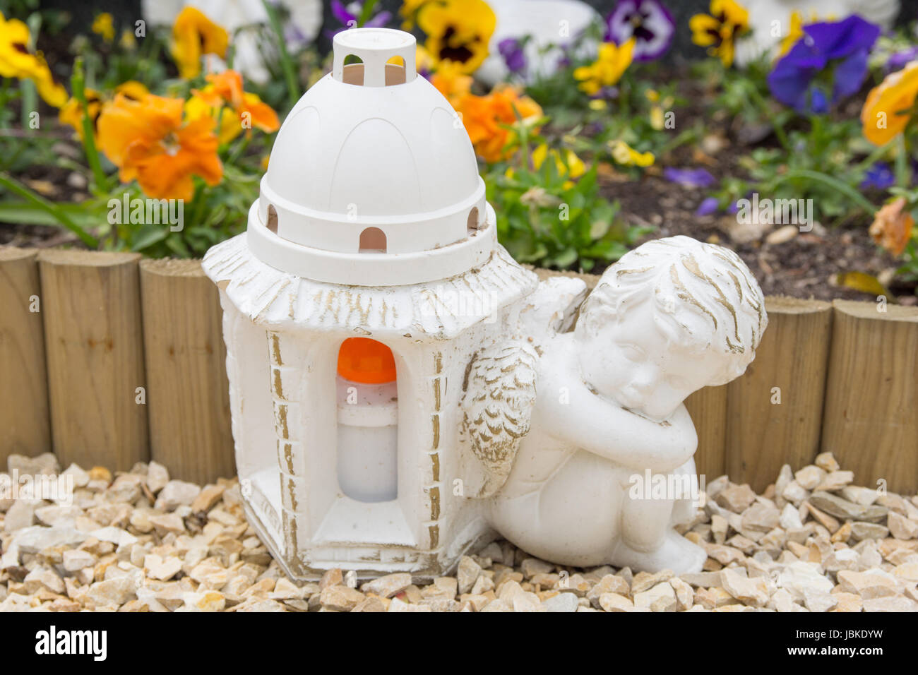little Angel on a cemetery Stock Photo - Alamy
