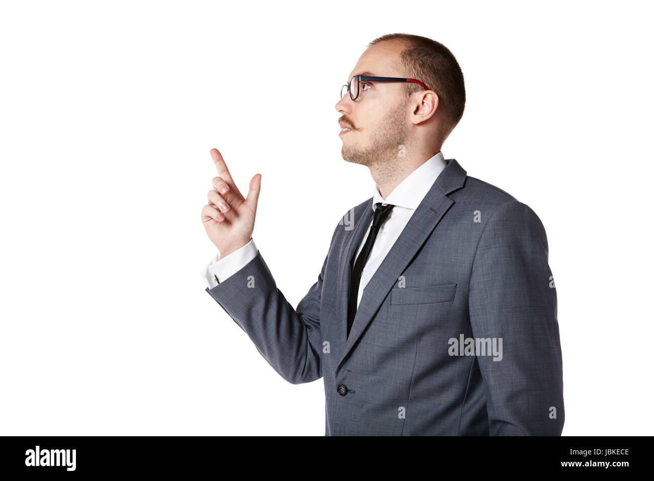 Young man pointing his finger. Isolated on white Stock Photo - Alamy
