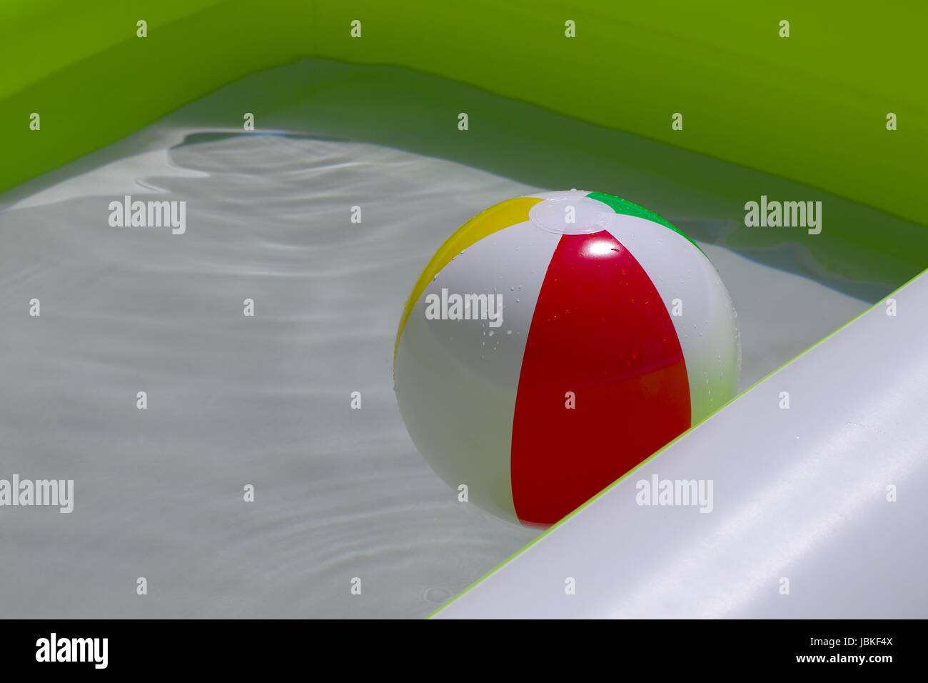 Rubber ball in a swimming pool Stock Photo - Alamy