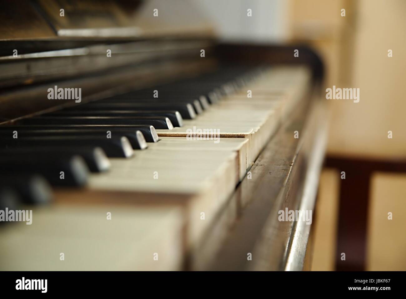 Old piano with faded keys Stock Photo - Alamy