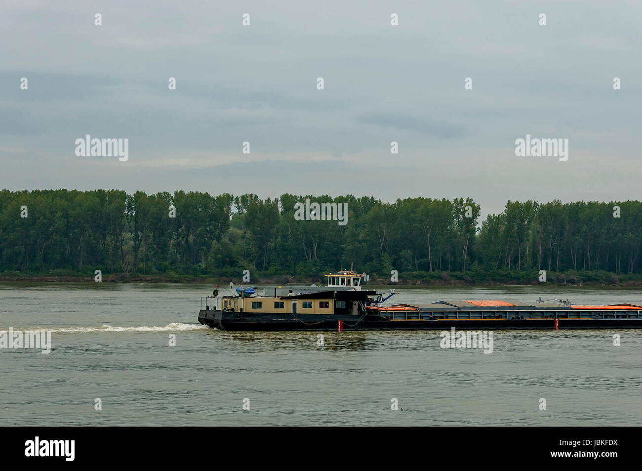 Pass tug-boat in the river Danube along Vidin port, Bulgaria, Europe ...