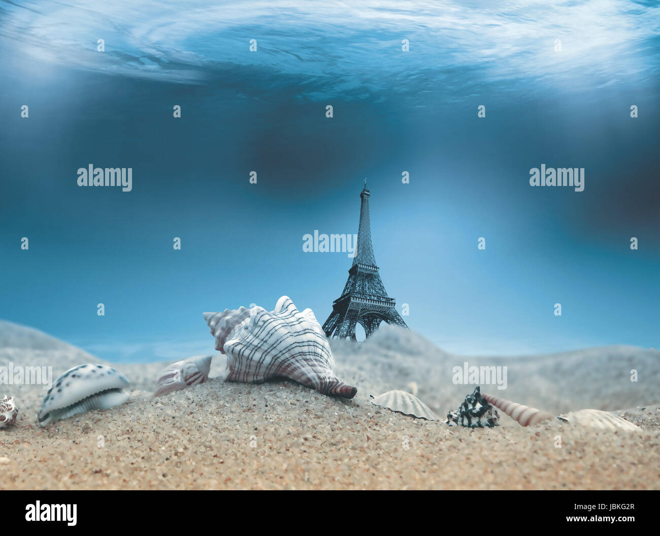 Paris: Eiffel Tower underwater with sand and shells Stock Photo - Alamy