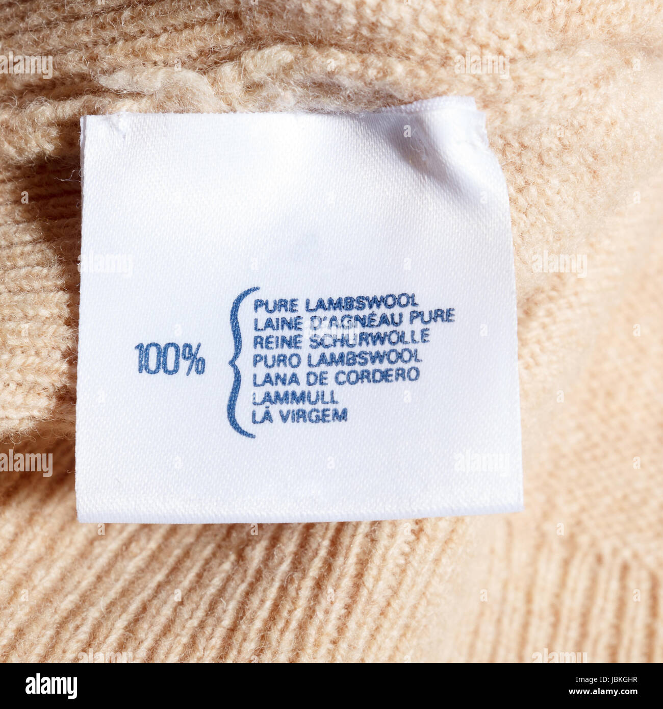 Pure lambswool label on wool jumper Stock Photo - Alamy