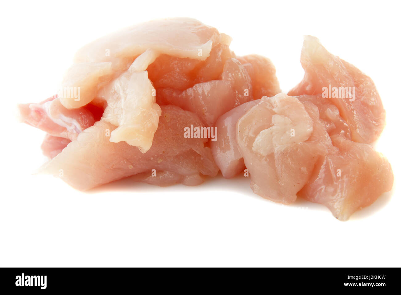 fresh chicken fillet on a white background Stock Photo - Alamy