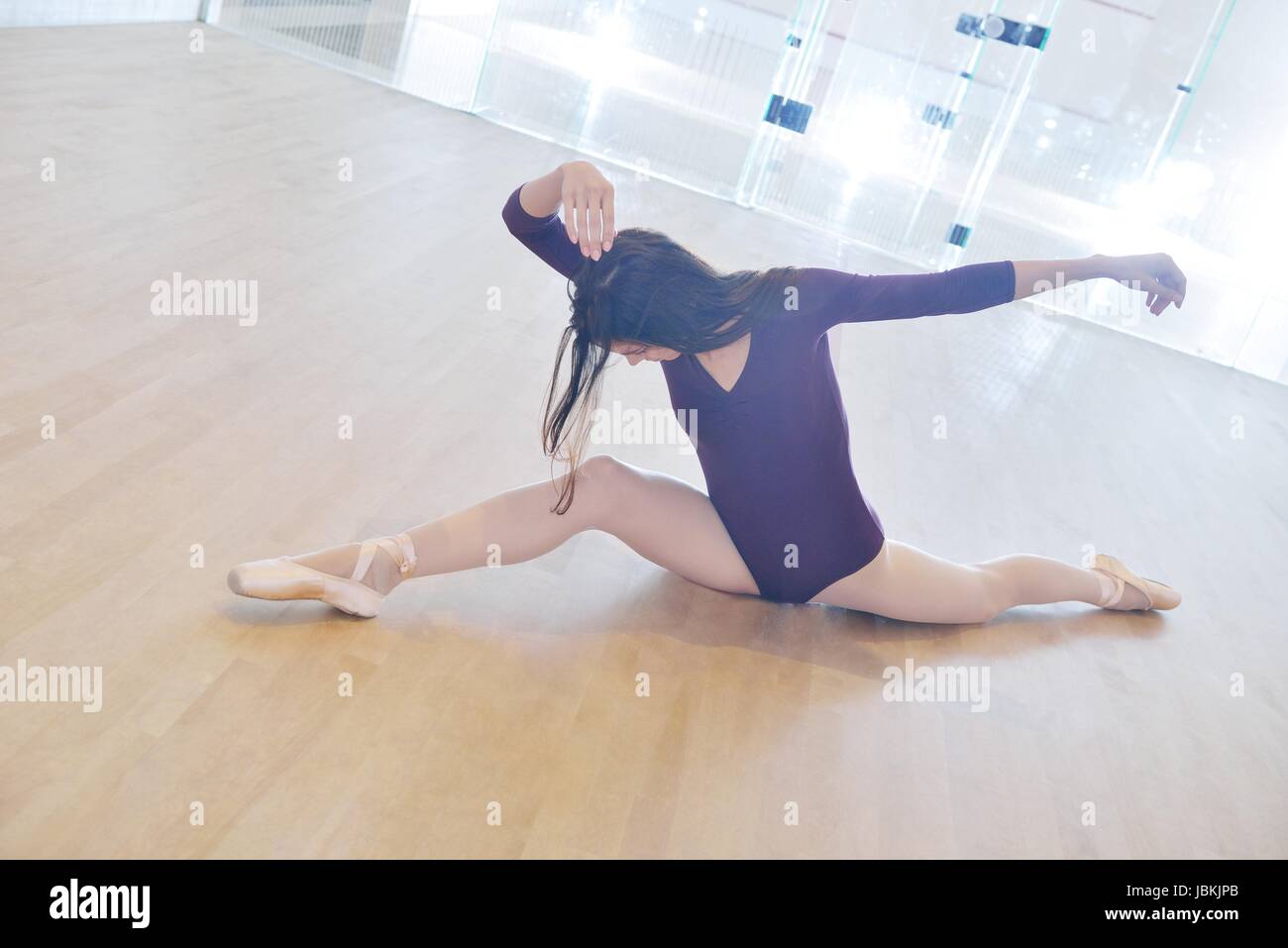 modern style ballet dancer posing and jumping on training Stock Photo ...