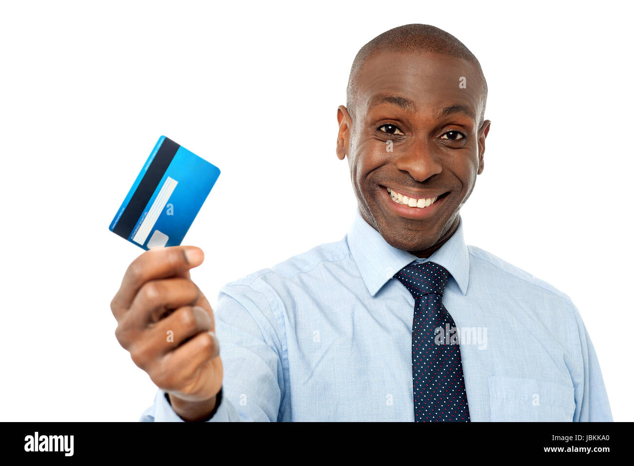 Smiling corporate man showing his debit card Stock Photo - Alamy